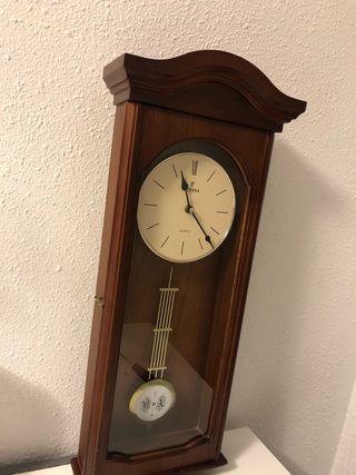 Reloj de pared con pendulo de segunda mano en WALLAPOP