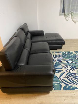 Divano in pelle con chaise loungue