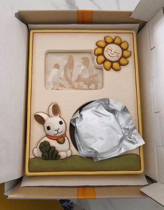 Cornice thun con impronta neonato