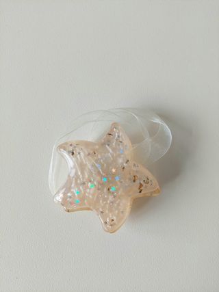 Fermatenda magnetico a stella con stelline interne