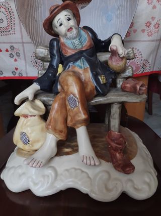 Statua porcellana Capodimonte Ubriaco panchina