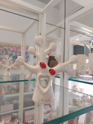 albero della vita con coccinelle rosse