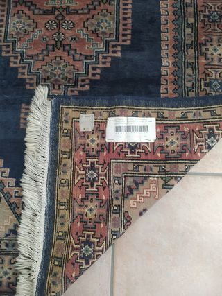 Tappeto persiano con cartellino 