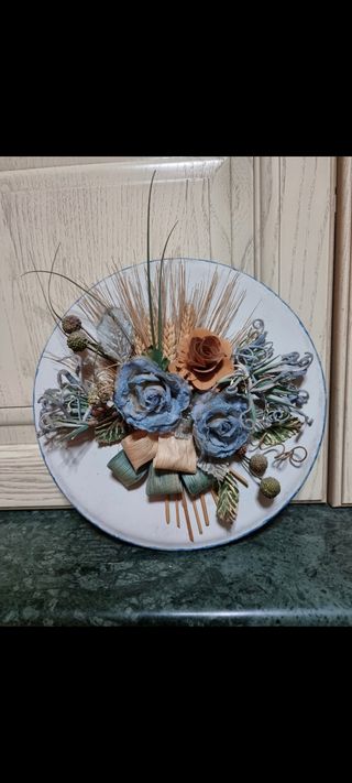 Ornamento da parete in ceramica