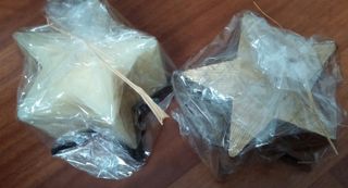 CANDELE A FORMA DI STELLA COLORATE