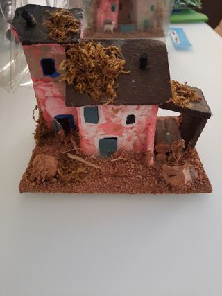 casetta presepe con legnaia