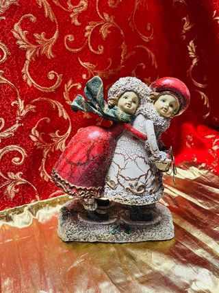  Statuetta decorativa  con due pattinatrici 