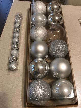 Palline grandi argento + un tubo piccolo