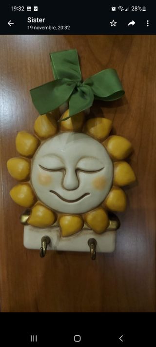 formella Thun girasole con due gancetti.