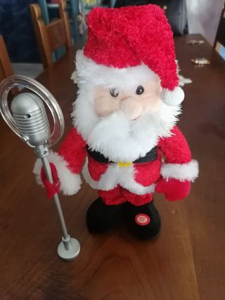 Babbo natale che canta marry Christmas e balla