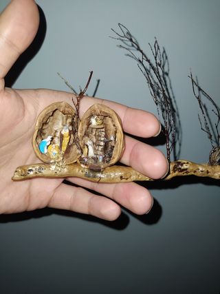 presepe realizzato a mano nella noce