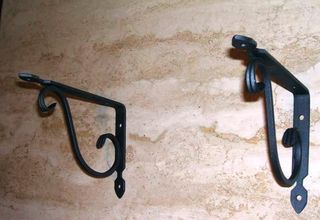 Coppia reggimensole ferro battuto