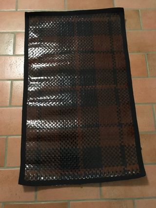 Tappeto in pelle intrecciata