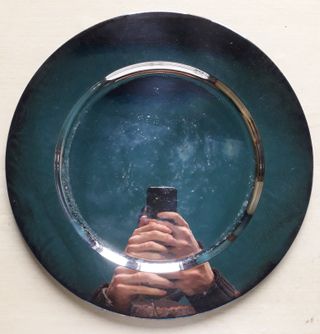 Piatto rotondo d'acciaio, placcato in argento