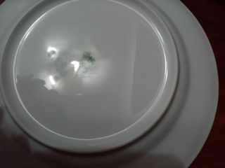 servizio di piatti e bomboniere di colore argento 