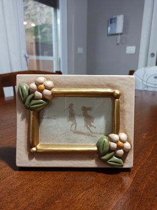 Cornice con fiori Thun