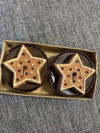 Set due candele a forma di stella natalizia