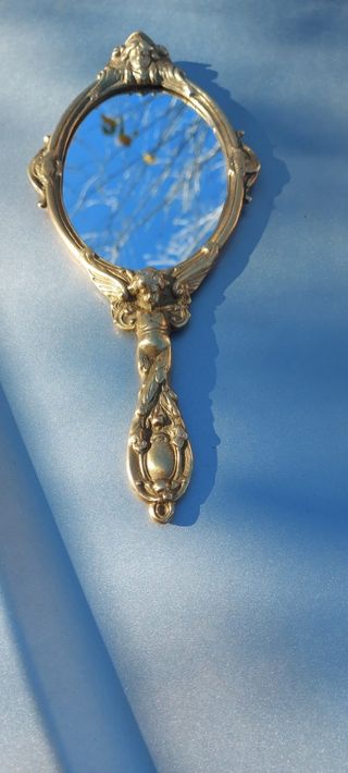 specchio vintage in ottone