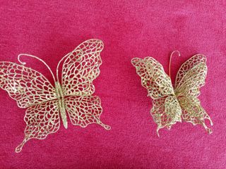 Coppia di farfalle dorate 