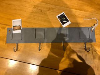 Appendino in metallo portafoto.