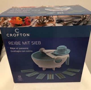 Grattugia con contenitore 