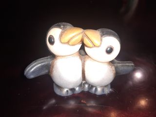 Pinguini bacio coppia Thun