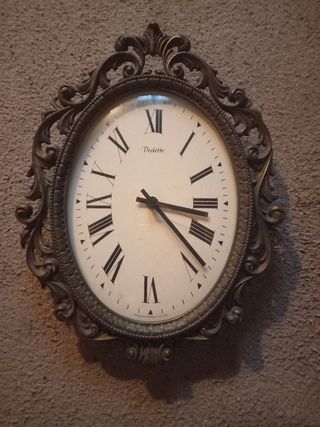 Orologio da muro in bronzo