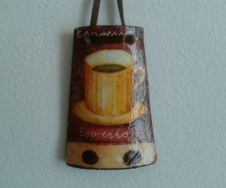 Piccola decorazione terracotta da appendere 