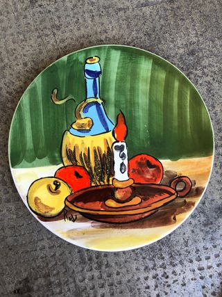 Piatto Vintage con candela, damigiana e mele