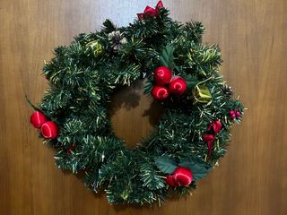 Corona decorativa fermaporta di Natale