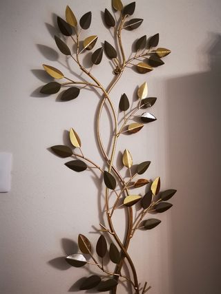 Decorazione da parte con foglie oro