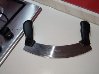 coltello mezzaluna acciaio inox