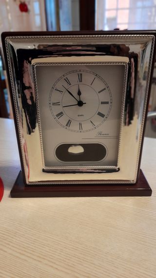 orologio da tavolo con pendolo in argento