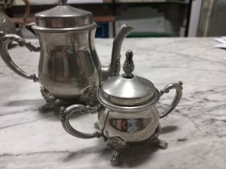 teiera 12cm+contenitore 7cm  7euro 