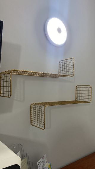 Coppia di scaffali color oro