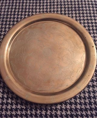 Piatto decorato in ottone