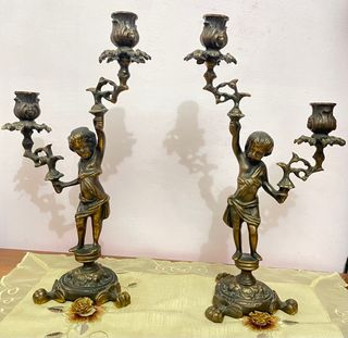 Antichi candelabri in bronzo 