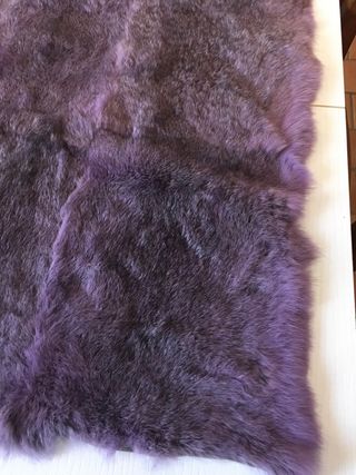 Tappetato in pelliccia viola