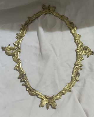 cornice in bronzo dorato