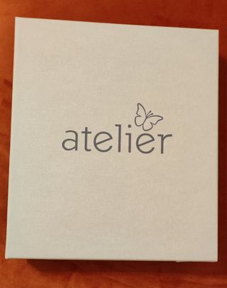 Portafoglio in argento laminato con retro in legno