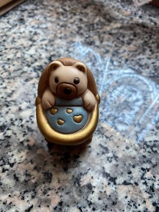 Orsetto nella culla Thun 