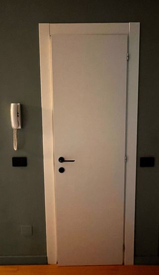 Porta bianca 60x120 con maniglia 