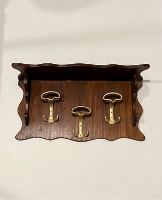 Attaccapanni in legno e ottone