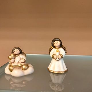 Thun. Coppia di angeli .