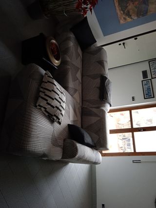 divano ad angolo con copridivano