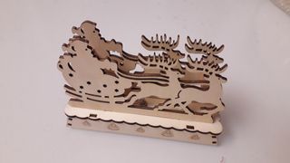 paesaggio legno natalizio natale con luce renna