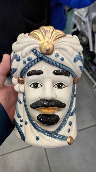 teste di moro siciliane, uomo e donna in ceramica
