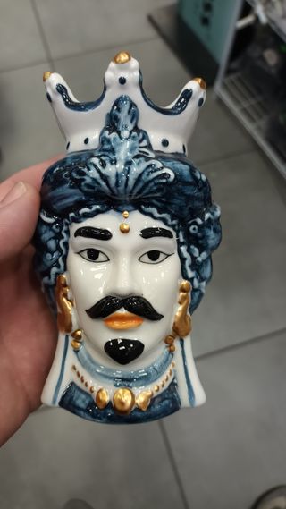 teste di moro siciliane,uomo e donna in ceramica