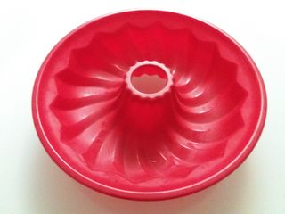 Stampo ciambella silicone rosso da forno usato