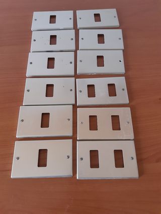 18 placchette in alluminio per interruttori